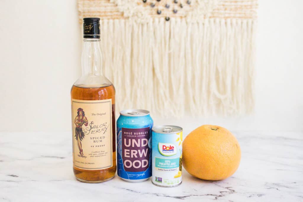 Sparkling Rosé Cocktail with Spiced Rum Recipe - Cupcakes and Cutlery